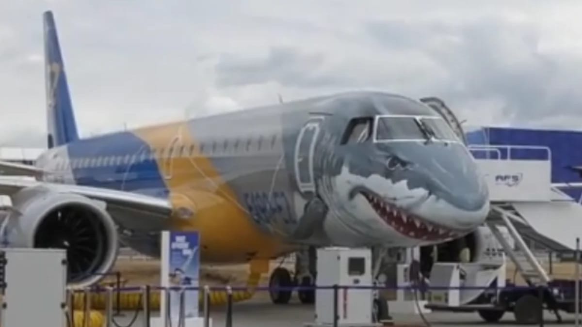 Shark-faced Embraer E190-E2 plane does a take-off so vertical it looks ...