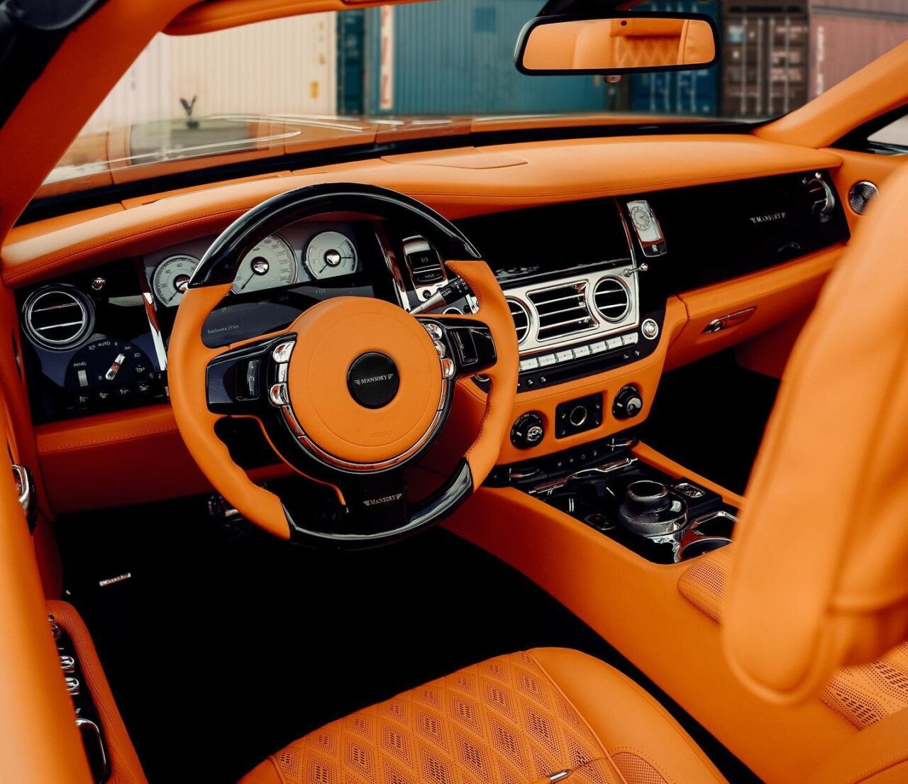 The Mansory Rolls-Royce Dawn is both outrageous and amazing