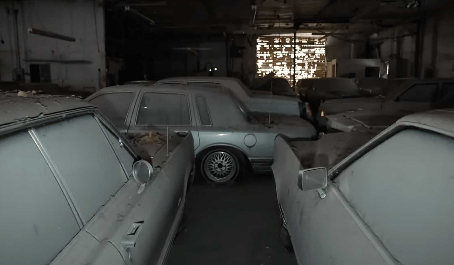 Dealership abandoned for 20 years packed with iconic cars