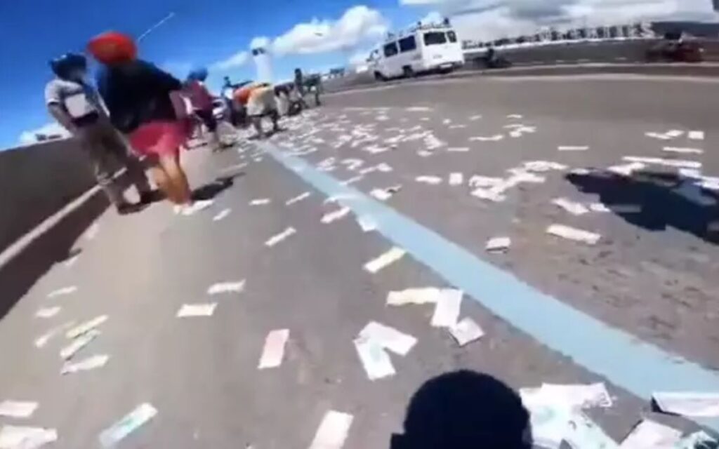 $50,000 cash flies from motorcyclist's backpack on freeway