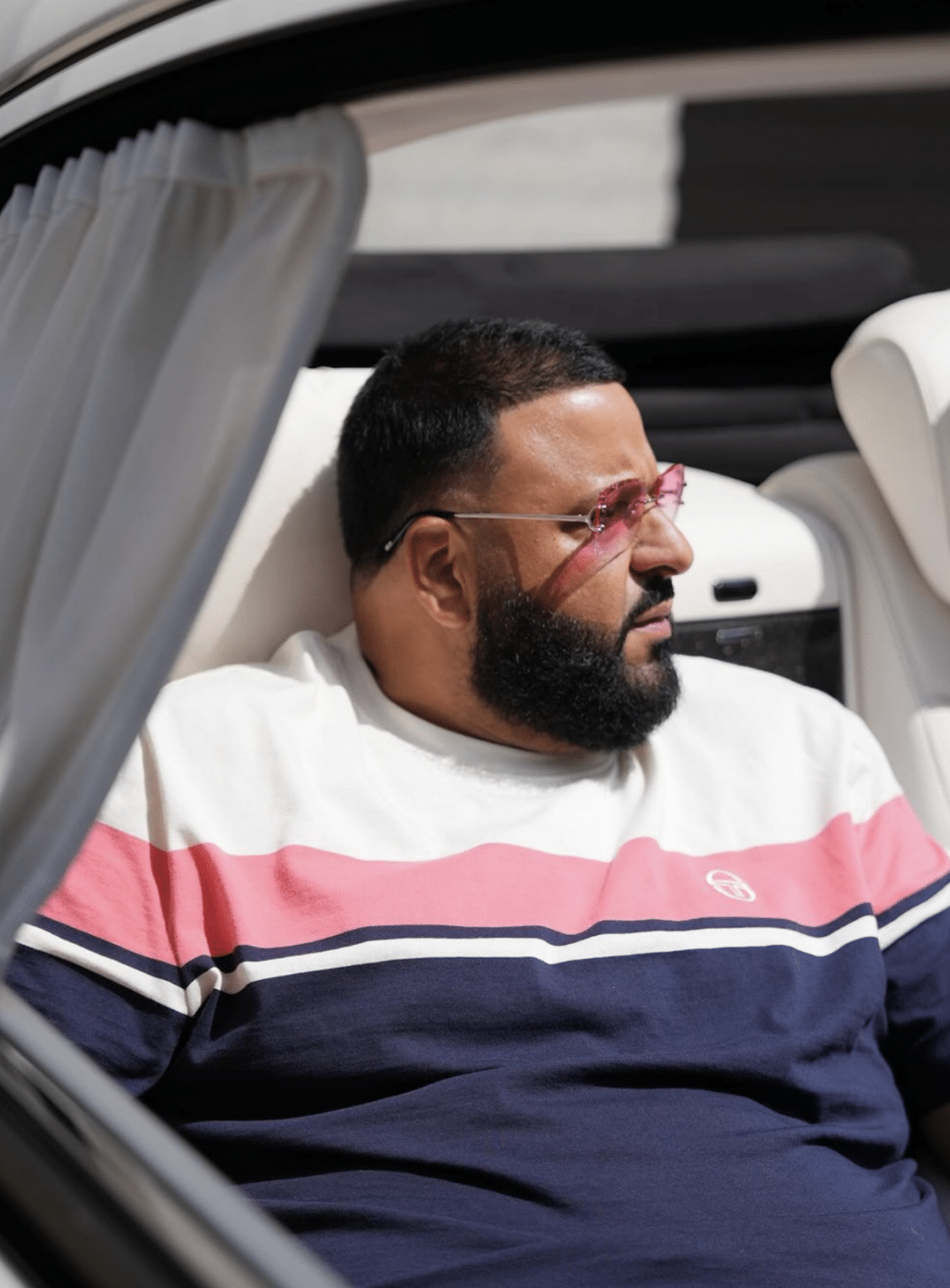 DJ Khaled shows off Scuderia Ferrari F1 car on his driveway