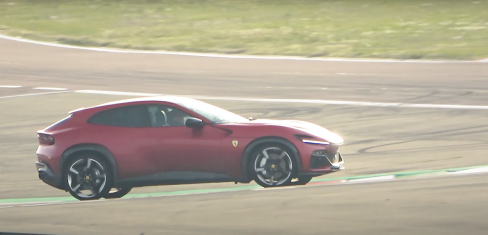 Watch a Ferrari Purosangue being thrashed around a racetrack