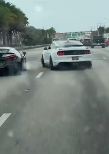 Fishtailing Mustang driver skillfully avoids hitting McLaren