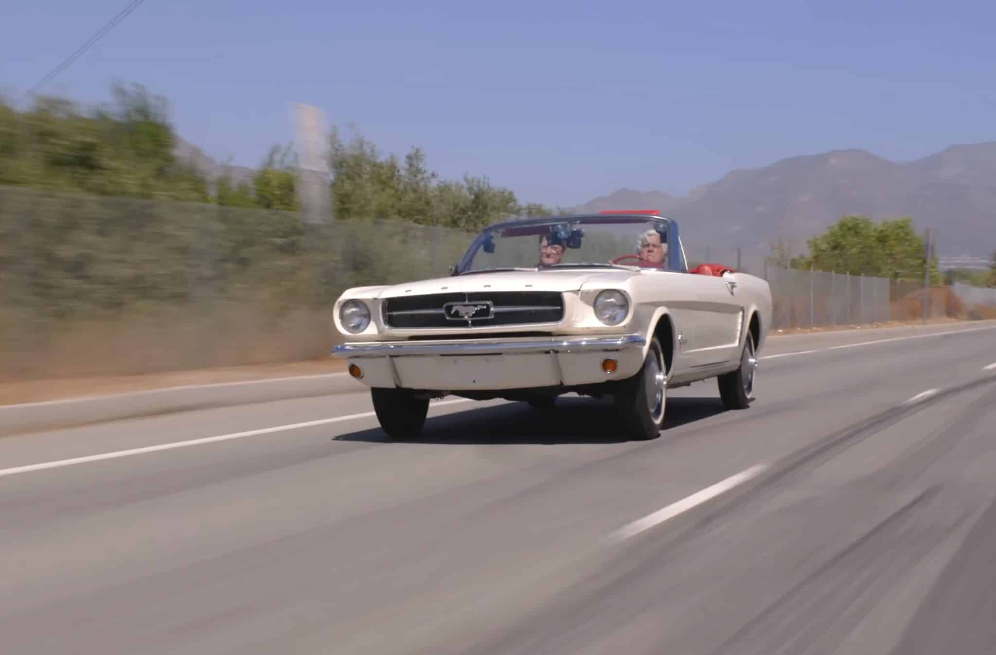 Jay Leno drives 1965 Ford Mustang he rode in 60 years ago