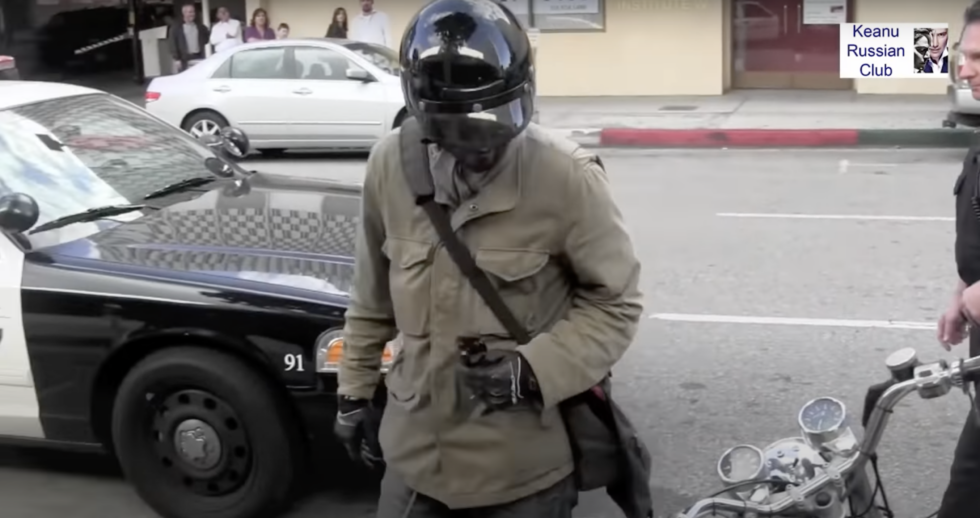 Keanu Reeves chilled despite woman backing into his bike