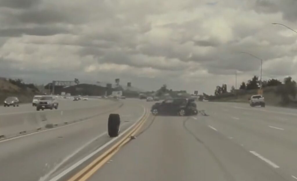 Footage shows runaway tire launching Kia Soul into the air