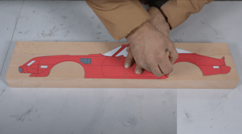 Watch as Pontiac Firebird Trans Am is whittled out of wood