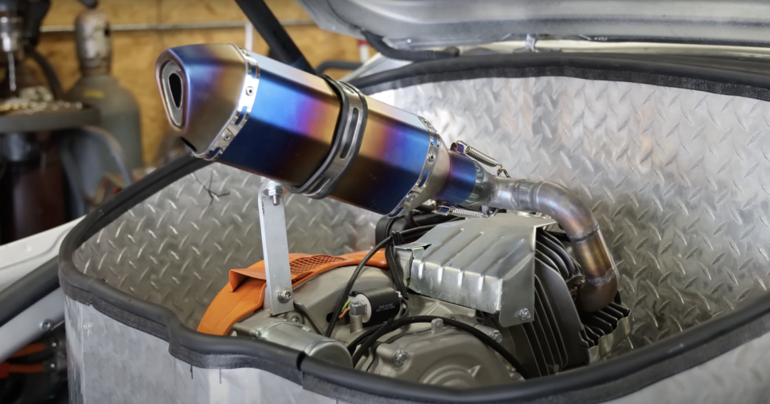 Guy puts gas generator in his Tesla to avoid plugging it in