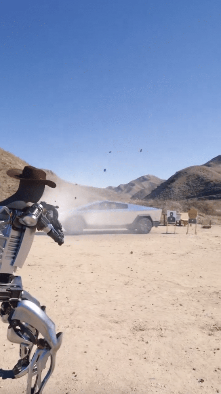 Tesla robot given submachine gun fires at Cybertruck