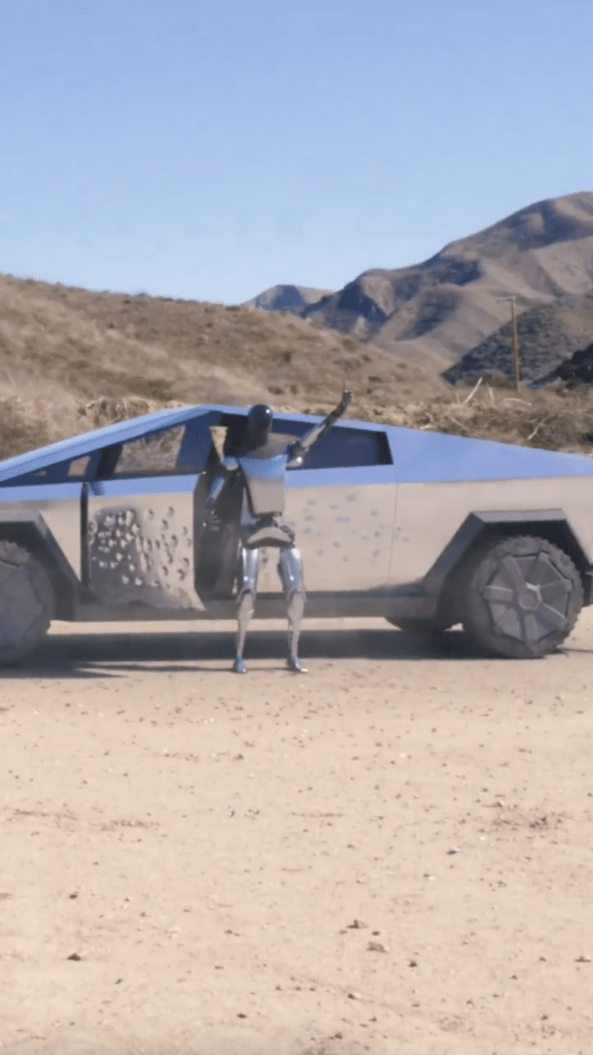 Tesla robot given submachine gun fires at Cybertruck